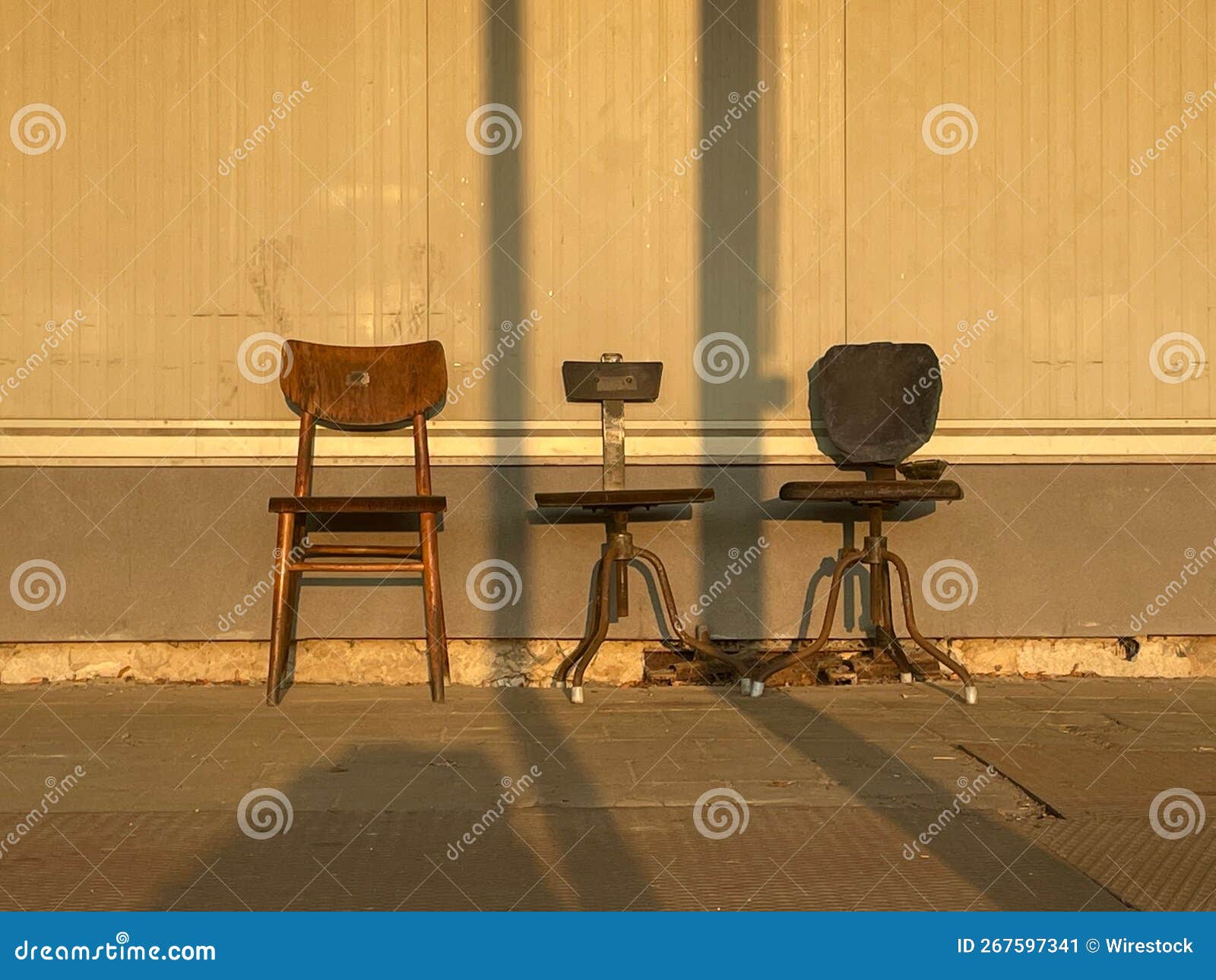 Three Old Chairs on Street at Sunset. Stock Image - Image of chairs, shadows: 267597341