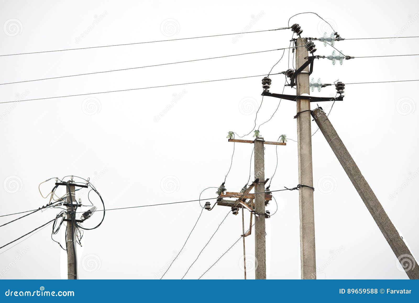 Three old electricity post stock photo. Image of equipment - 89659588