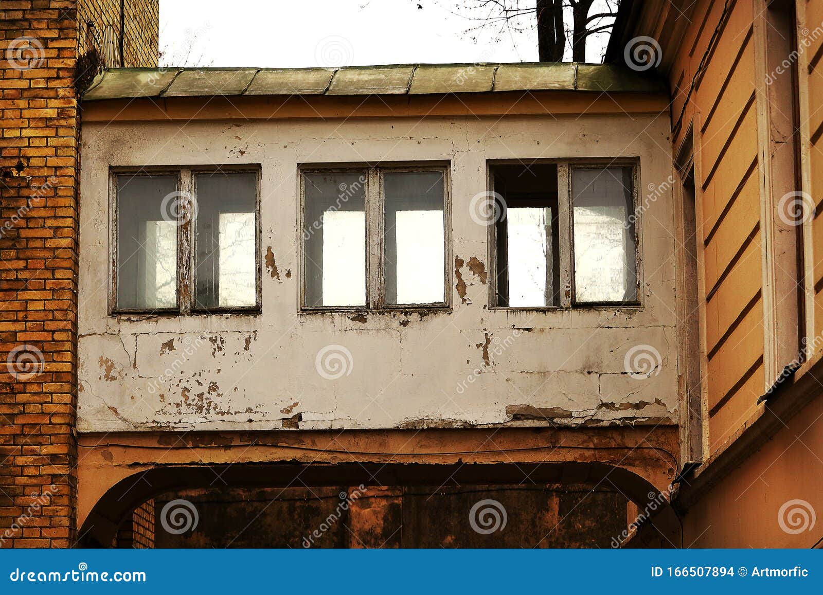 Three Old Rusty Windows in White Corridor Bridging Buildings Stock ...