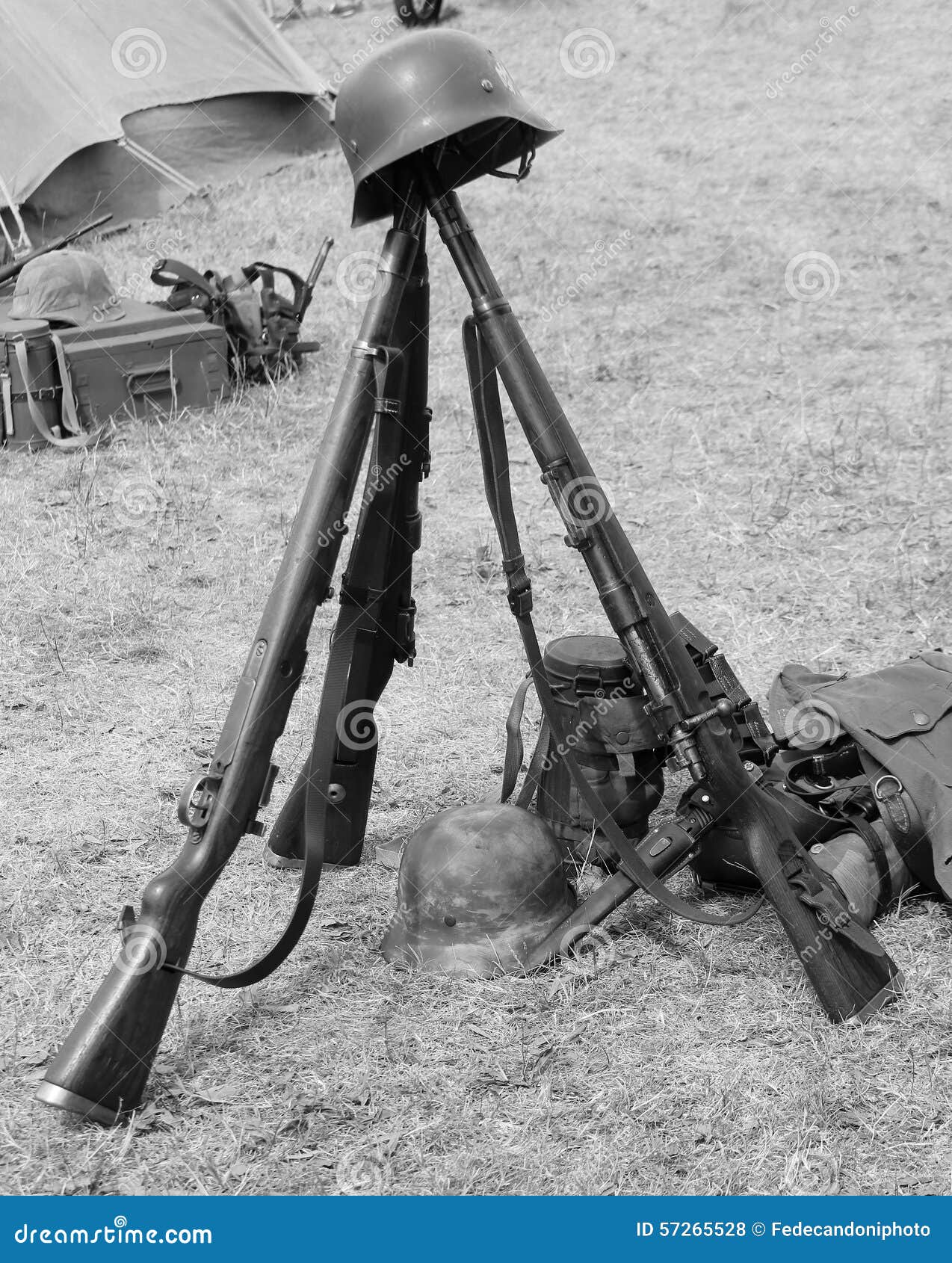Three Old War Rifles and Helmets of Dead Soldier Stock Photo - Image of ...