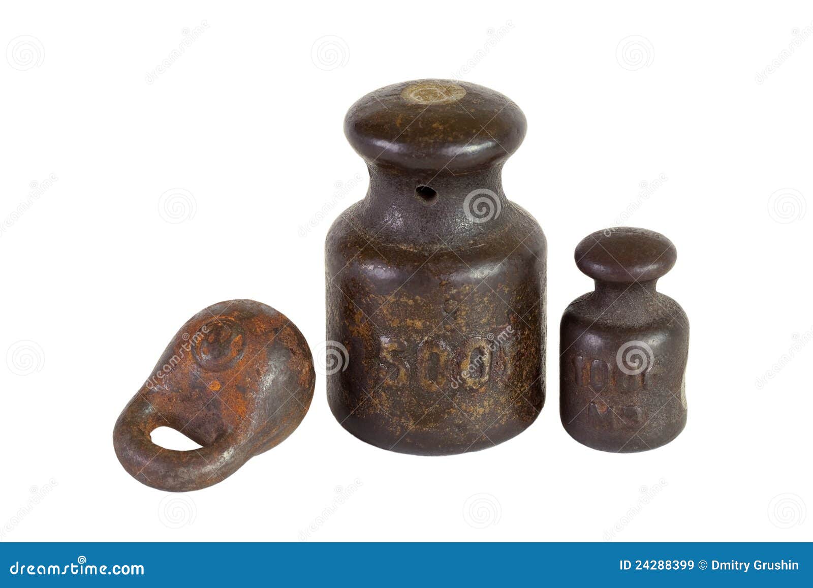 Three Of The Old Weights For Scales Picture. Image: 24288399