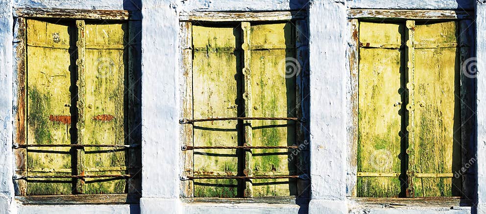 Three Old Windows with Wooden Shutters Stock Photo - Image of ...