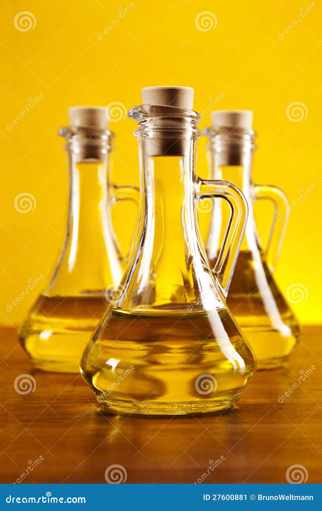 Three olive oil bottles stock image. Image of fresh, background - 27600881