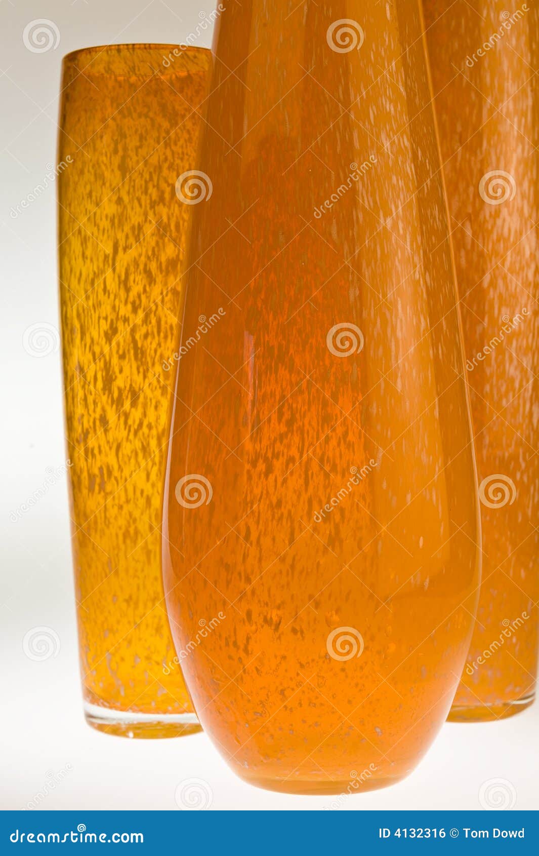 Three orange glass vases stock photo. Image of shapes - 4132316
