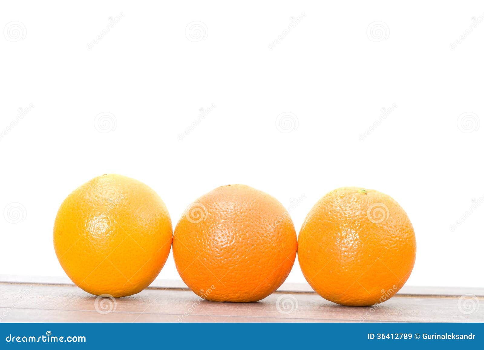 Three Oranges on a Wooden Table Stock Image - Image of table, food ...