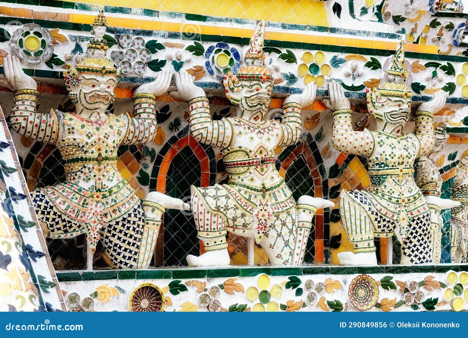 Three Ornate Statues on a Temple Wall. the Statues are of Three Figures ...