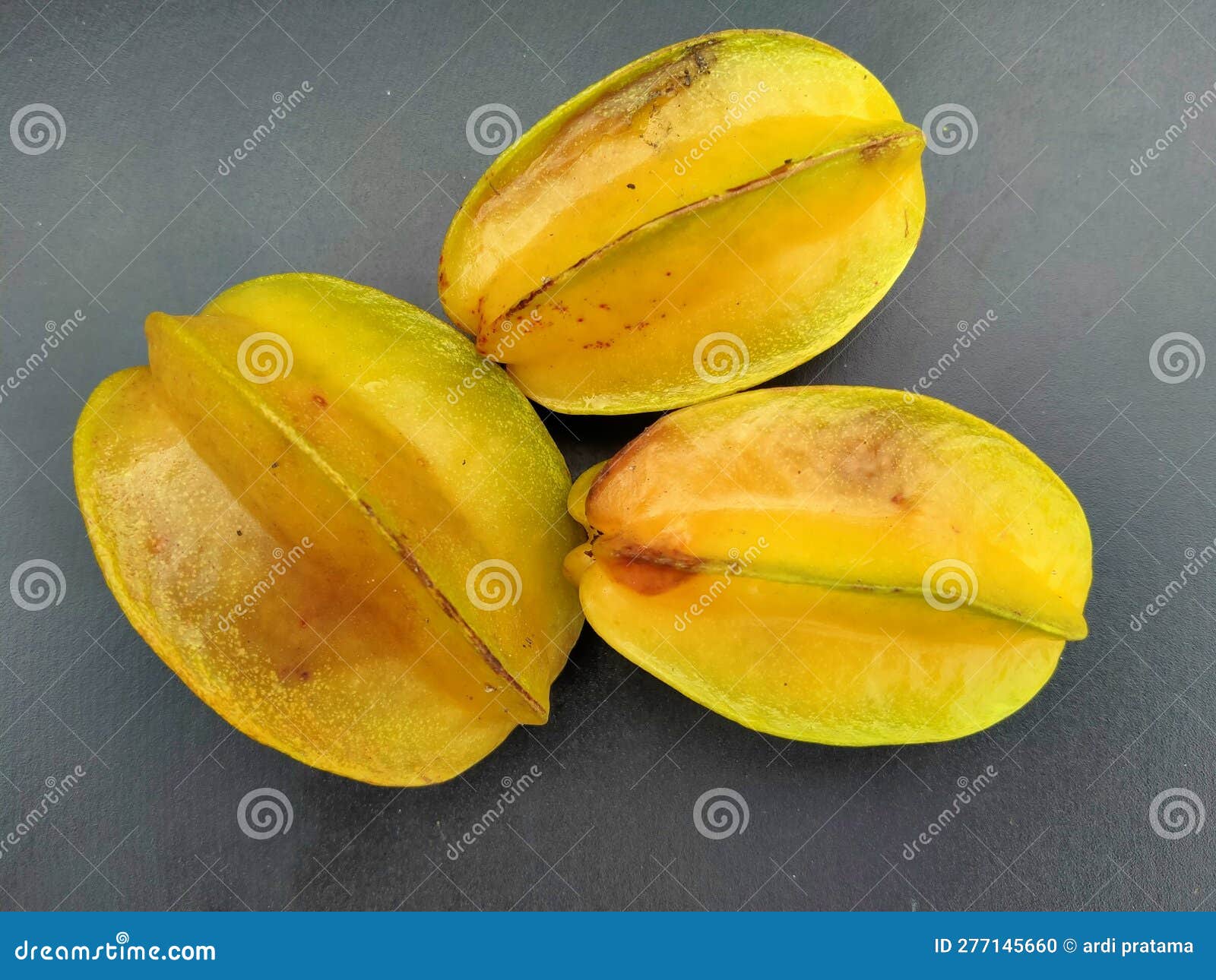 Three Overripe Yellow Star Fruit Fell from the Tree Stock Photo - Image ...