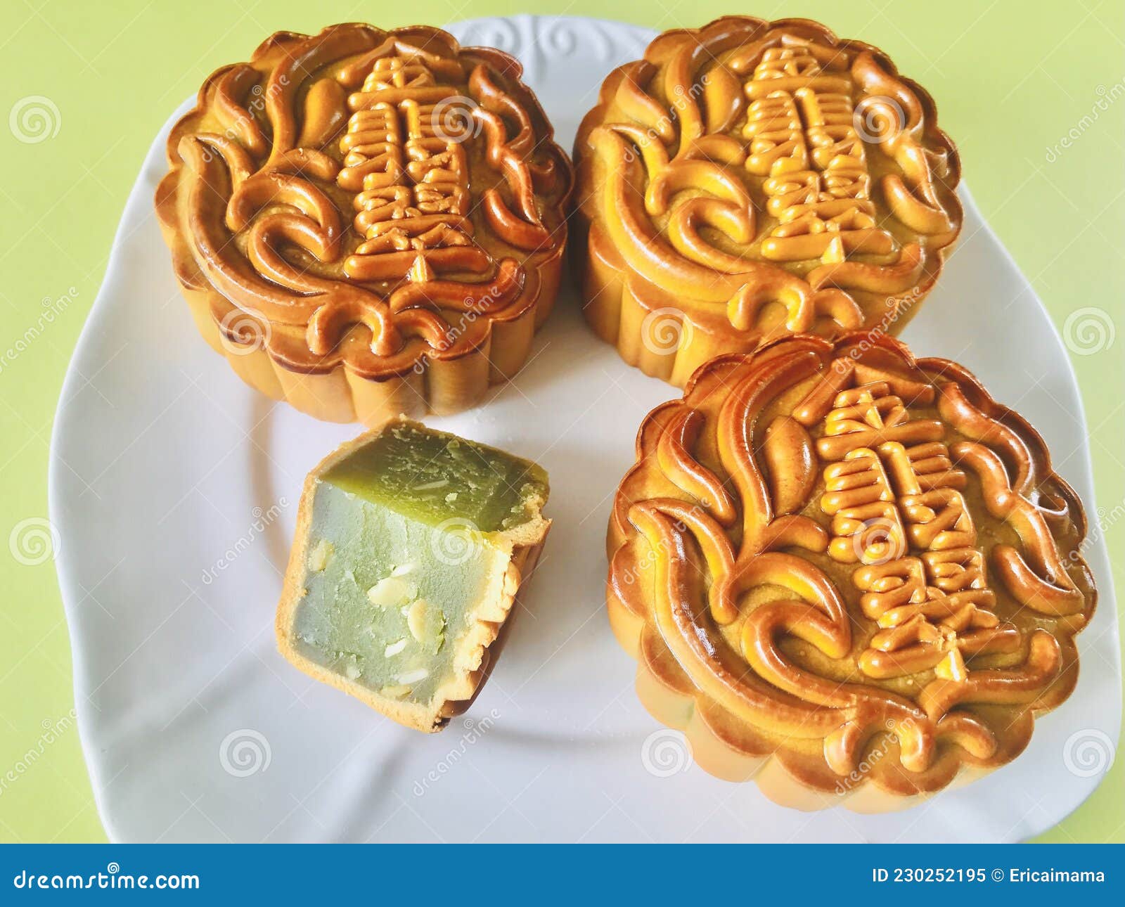 Three Pandan Seed Paste MoonCake With A Portion Cutout, Green ...
