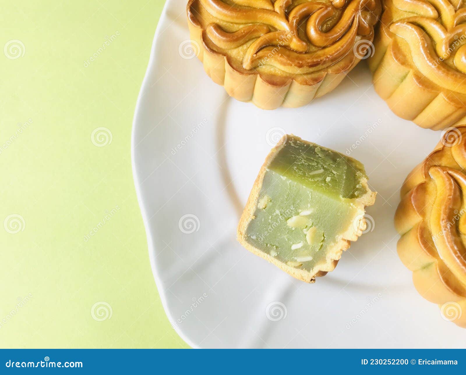 Three Pandan Seed Paste MoonCake With A Portion Cutout, Green ...