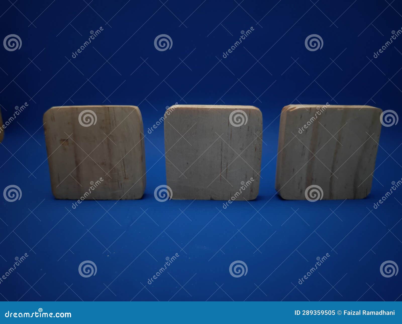 Three Parallel Square Wooden Blocks Stock Image - Image of lighting ...