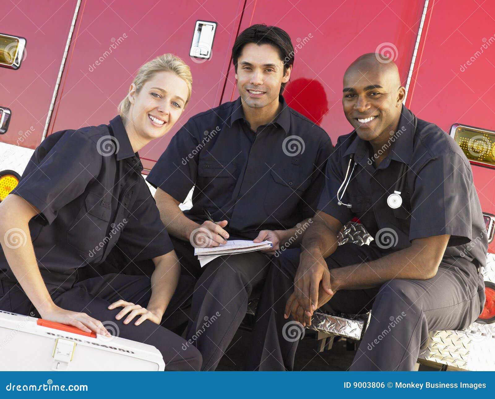 Three Paramedics Chatting by Ambulance Stock Photo - Image of caucasian ...