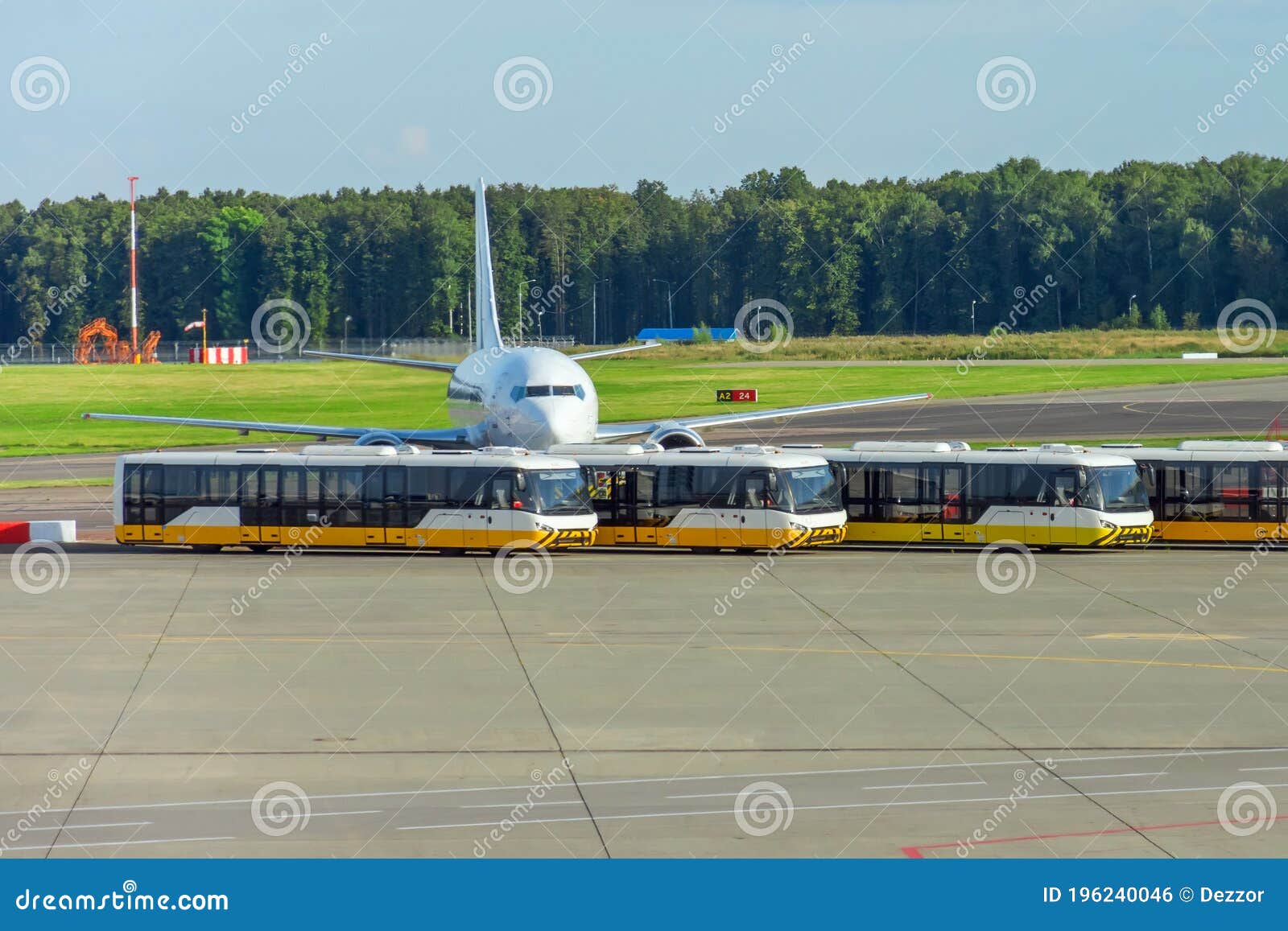 Three Passenger Buses in Front of the Plane on the Apron at the Airport ...