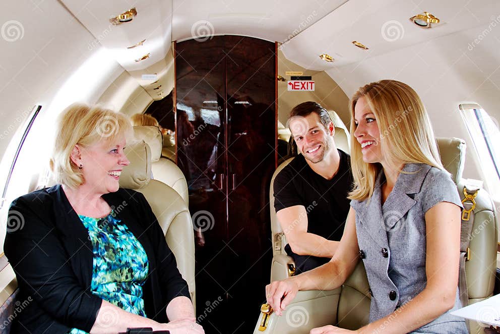 Three Passengers on Jet Enjoying Laugh Stock Image - Image of smile ...