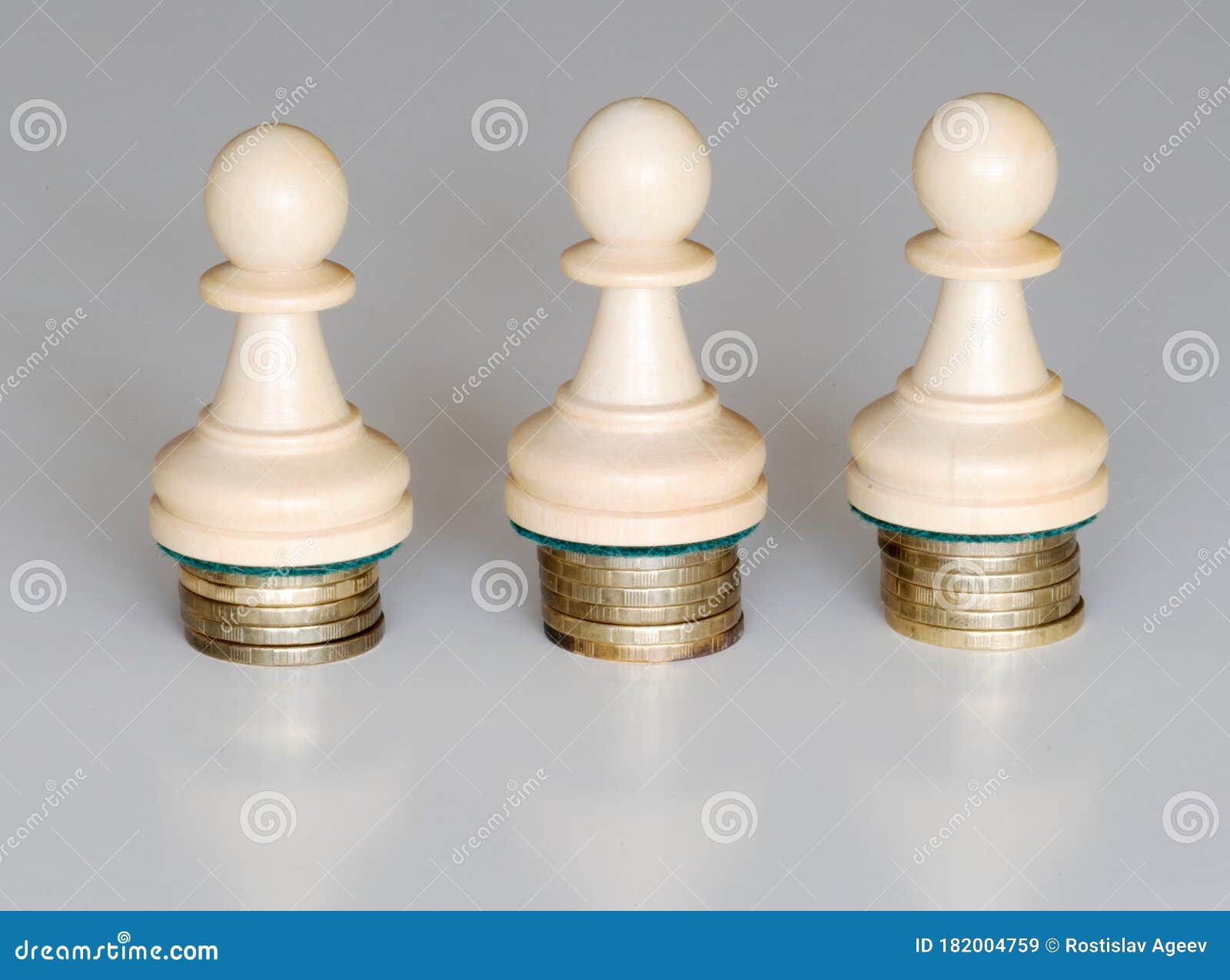 Three Pawns Chess Pieces on Columns of Coins, Symbolizing the Equality ...