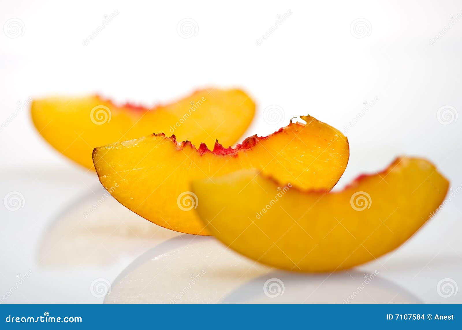 Three Peach Slices with Reflection Stock Photo - Image of group, peach ...