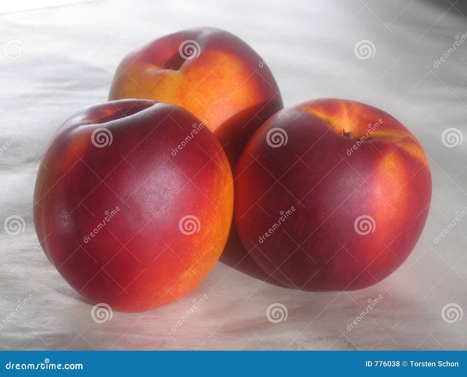 Three peaches stock photo. Image of detail, light, delicious - 776038