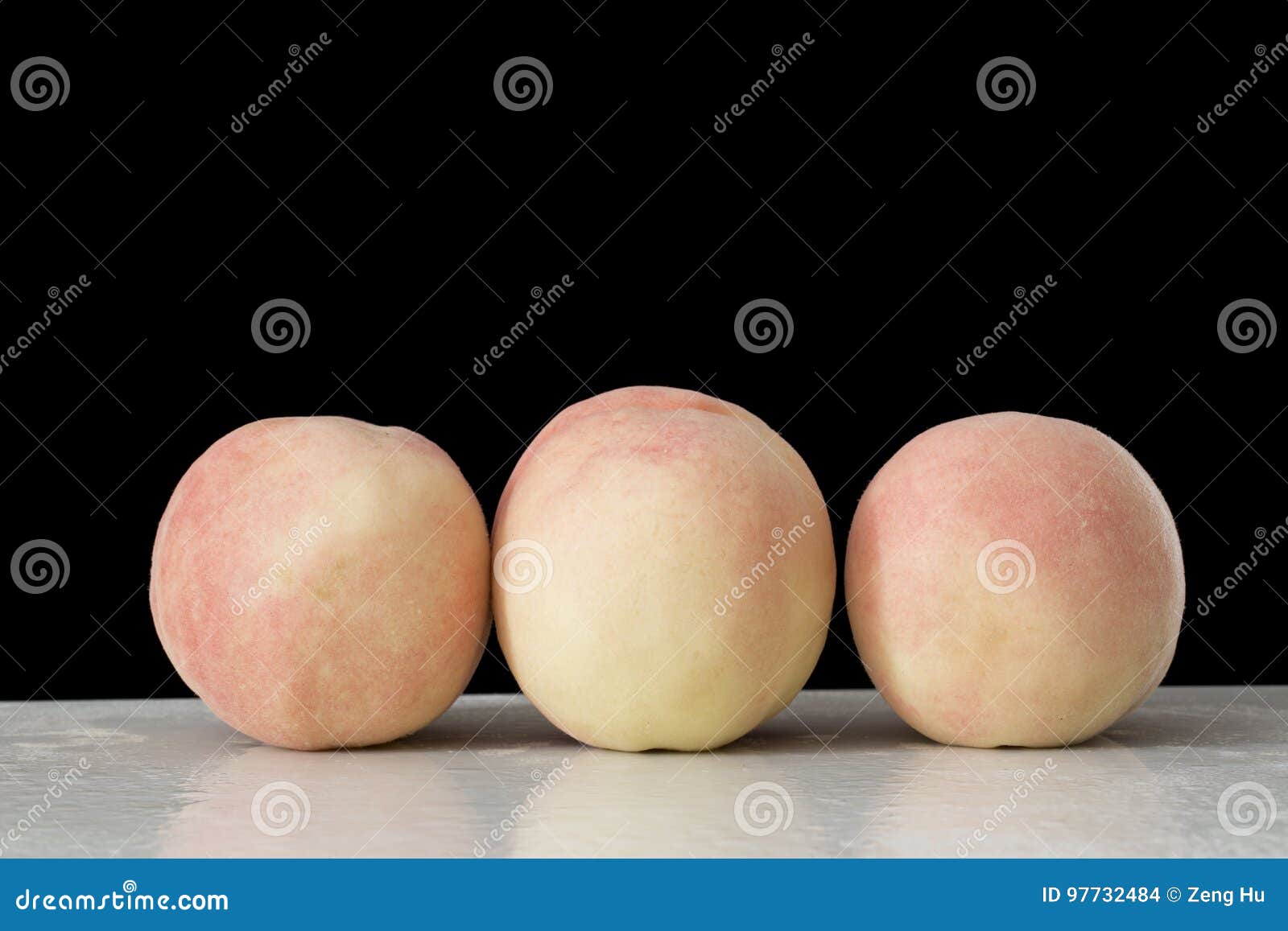 Three peaches stock photo. Image of freshness, color - 97732484
