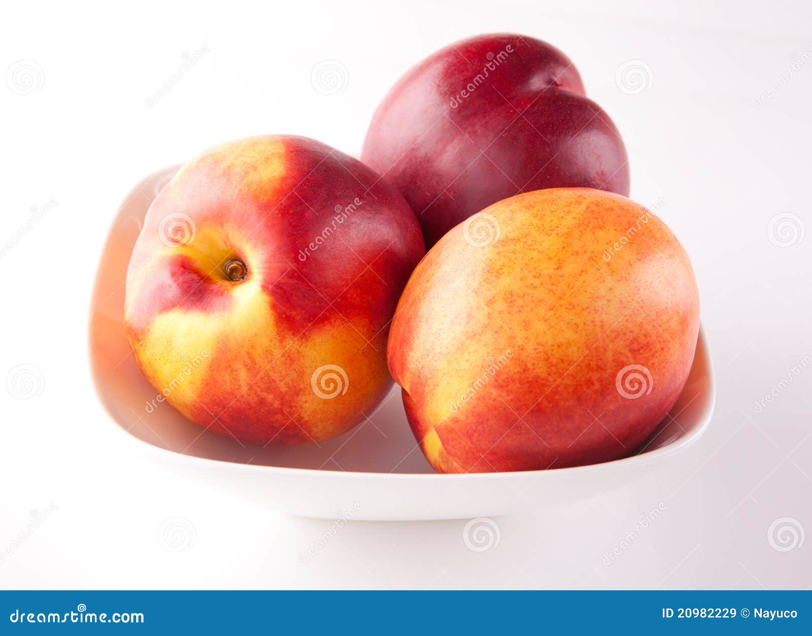 Three peaches on a plate stock image. Image of organic - 20982229
