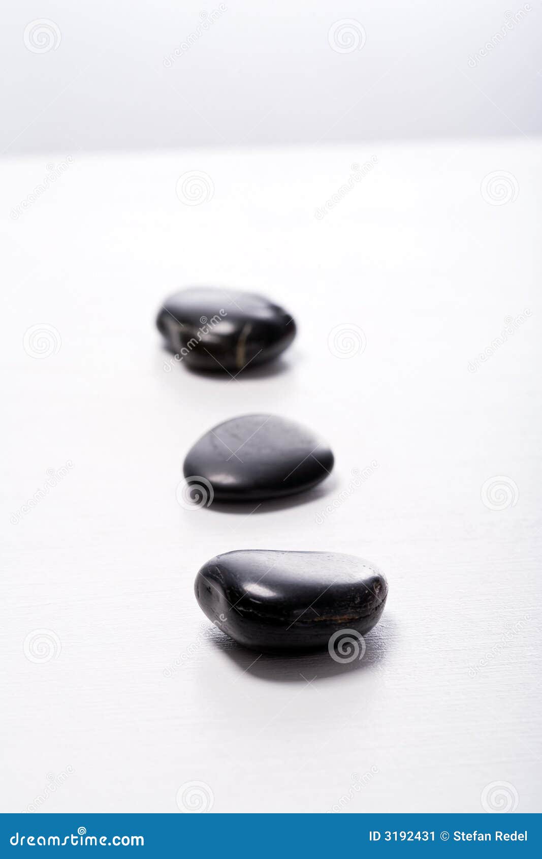Three Pebble Stones in a Row Stock Image - Image of stones, white: 3192431