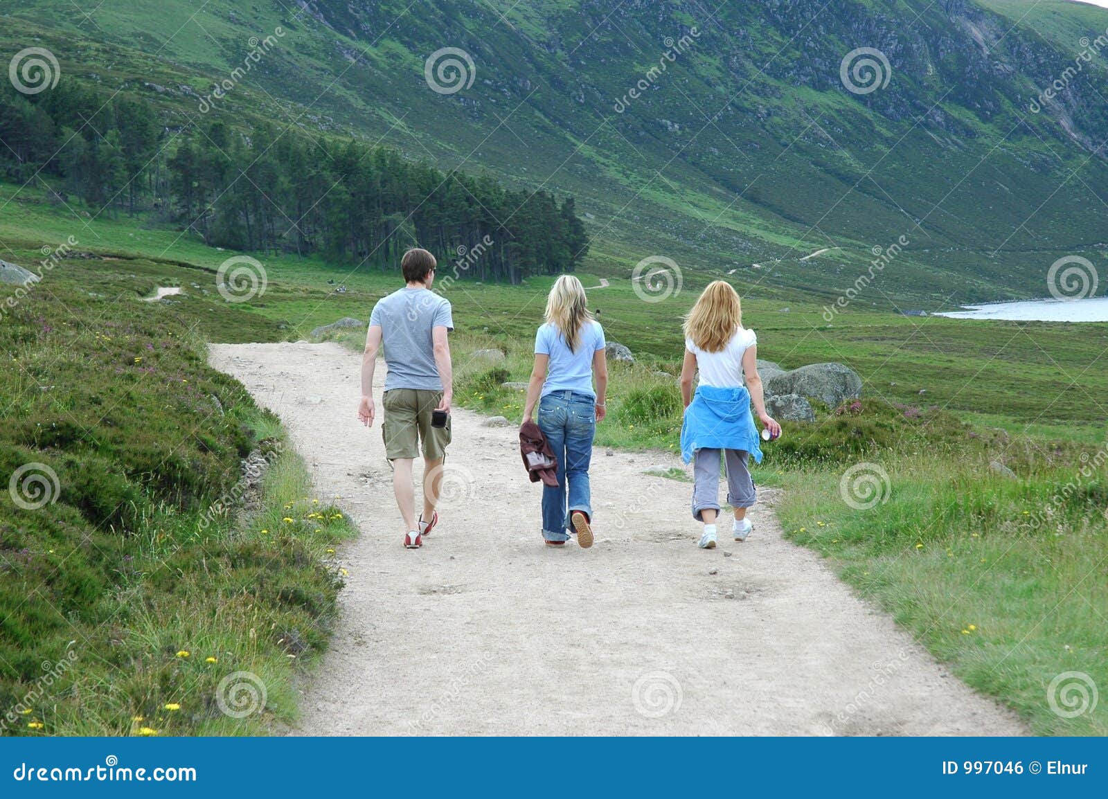 Three people stock photo. Image of threesome, coutryside - 997046