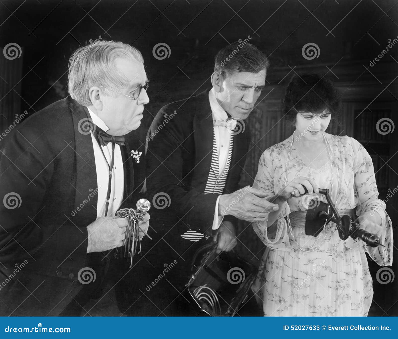 Three People Checking Out a Manual Drill Stock Image - Image of ...