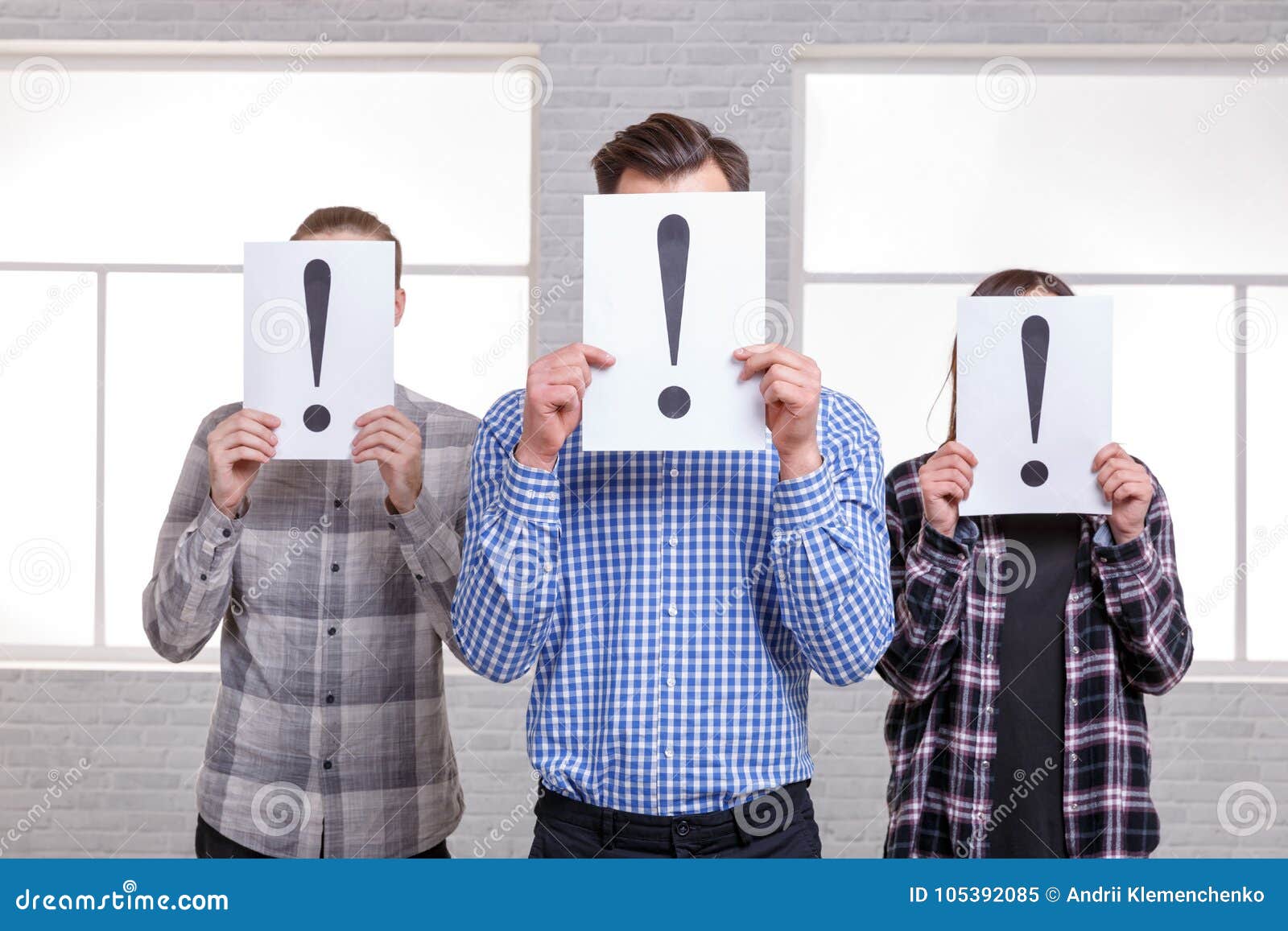 Three People Close Their Faces with Sheets with Exclamation Marks Stock ...