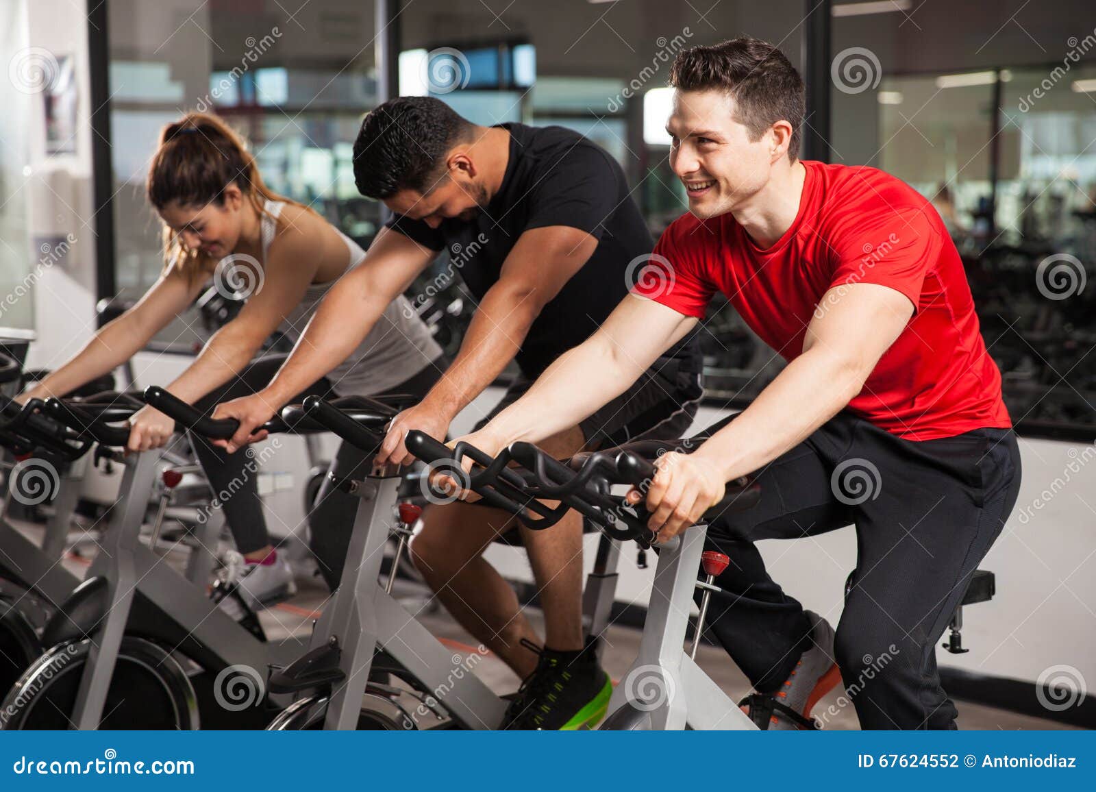 Three People Doing Spinning in a Gym Stock Photo - Image of hispanic ...
