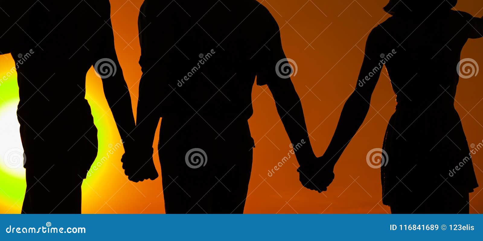 Silhouetted People Holding Hands