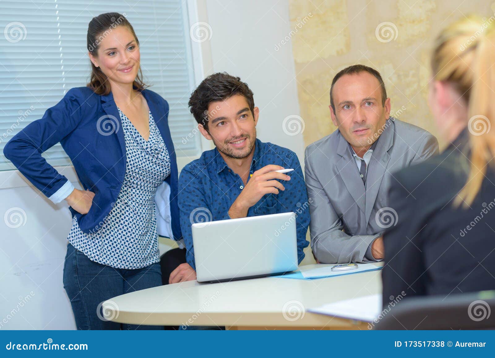 Three People Interviewing Woman Stock Photo - Image of woman ...