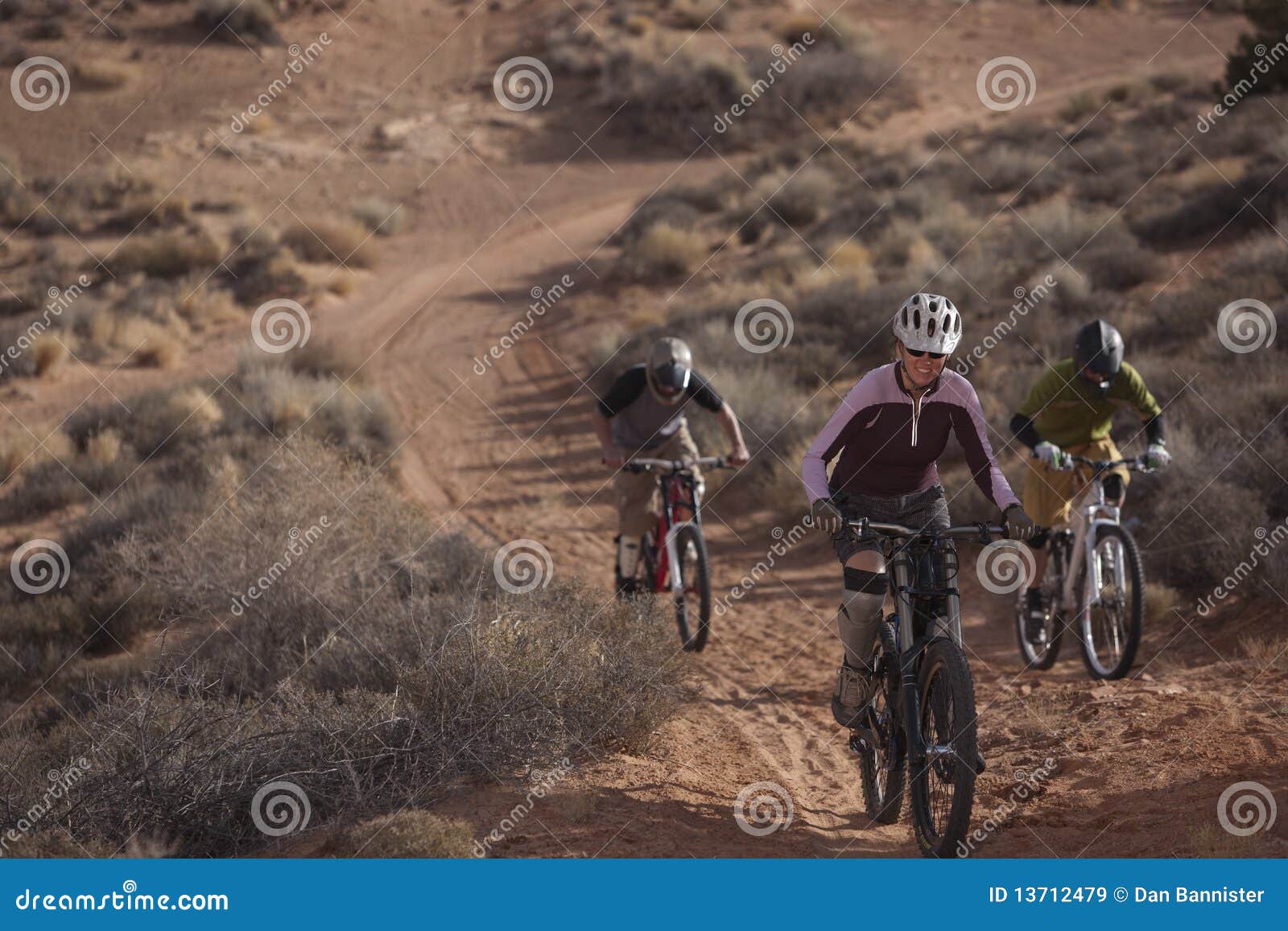 Three People Riding Mountain Bikes Stock Image - Image of male ...