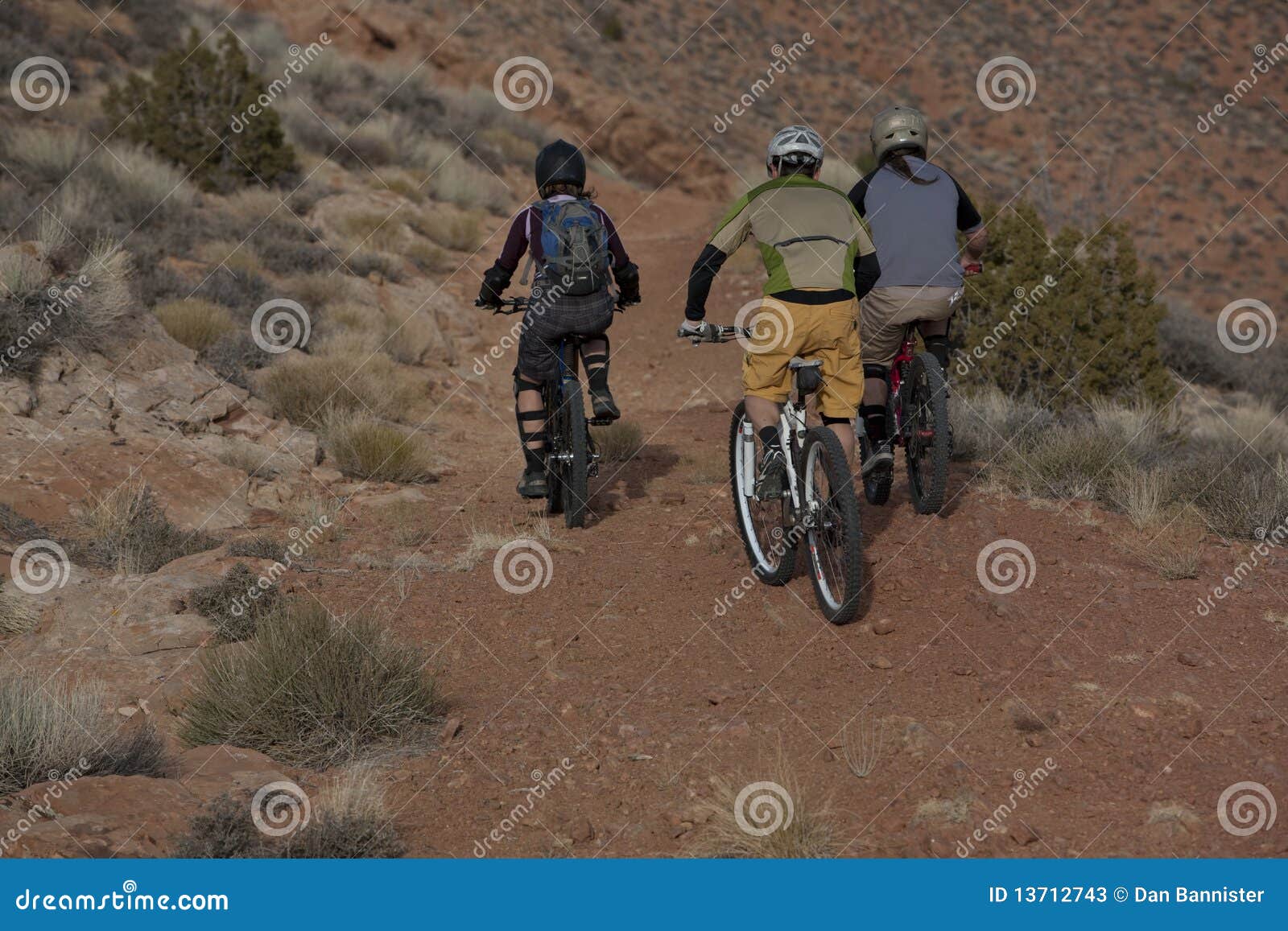 Three People Riding Mountain Bikes Stock Image - Image of riding, ride ...