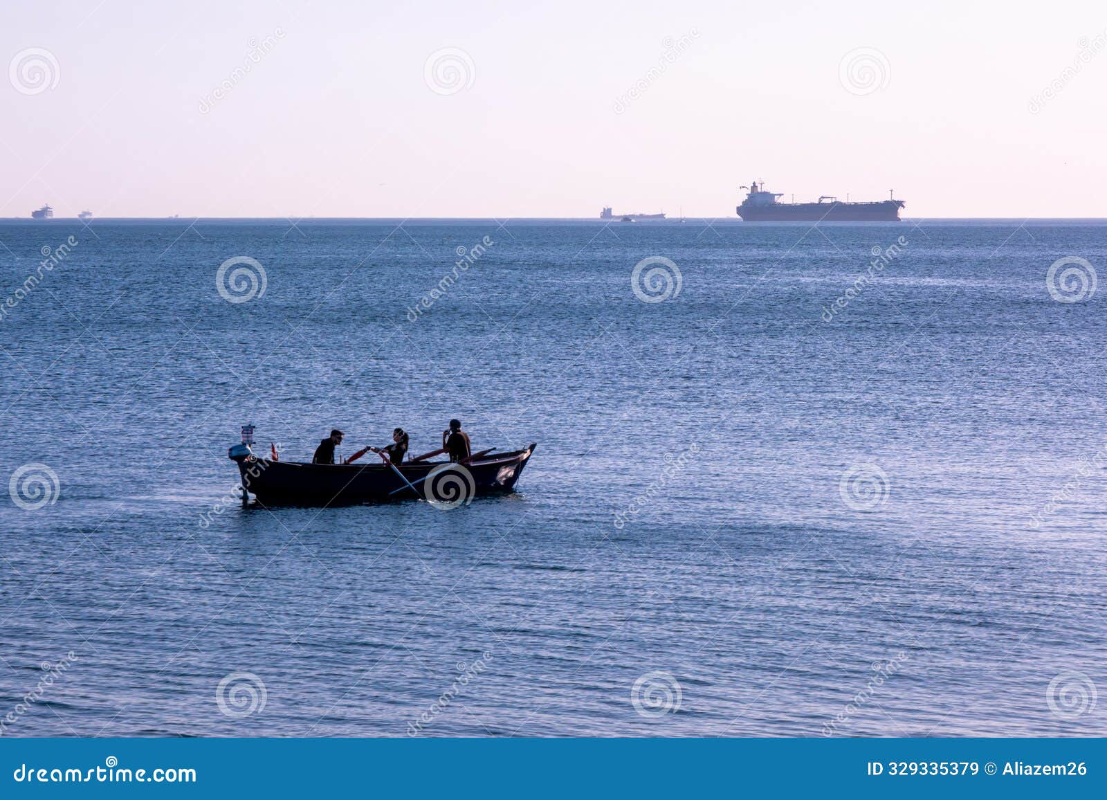 Three People Rowing a Boat on a Calm Lake Stock Image - Image of wave ...