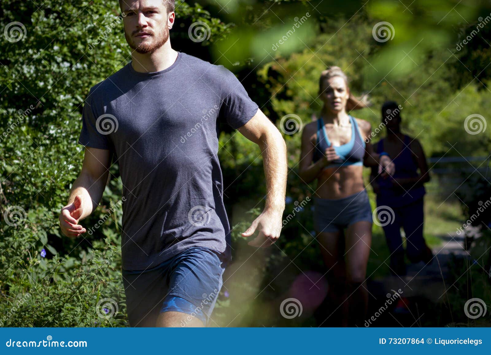 Three People Running stock photo. Image of marathon, outdoors - 73207864