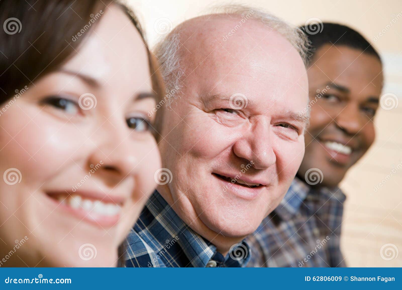 Three people smiling stock image. Image of enjoy, focus - 62806009
