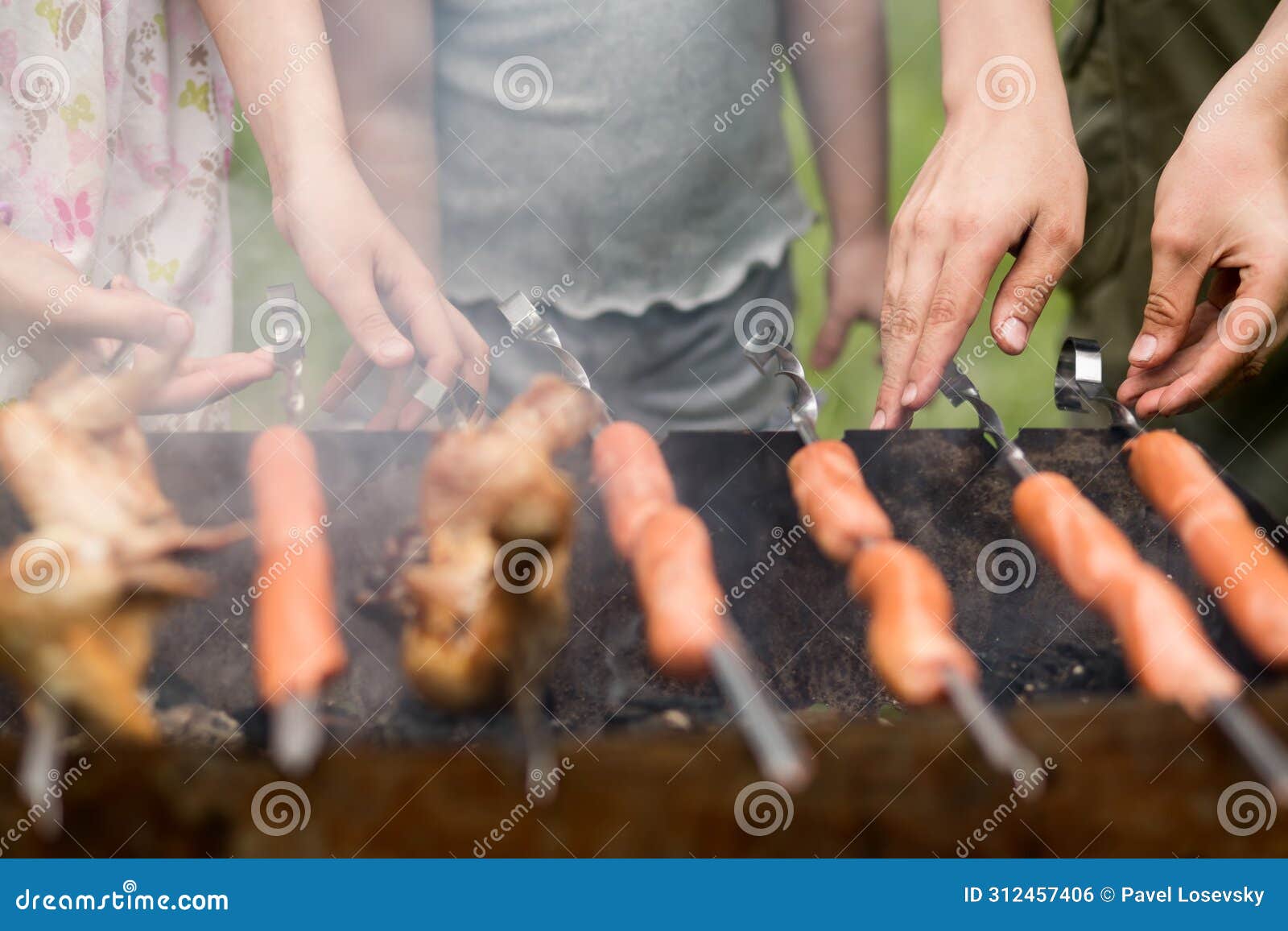 People Turn Skewers on the Grill Stock Photo - Image of human, resting ...
