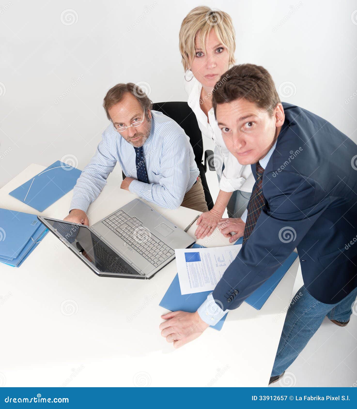 Three people at work stock image. Image of concentration - 33912657