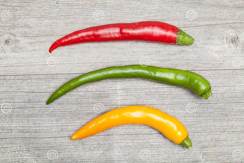 Three peperonis stock photo. Image of agriculture, vitamin - 54105026