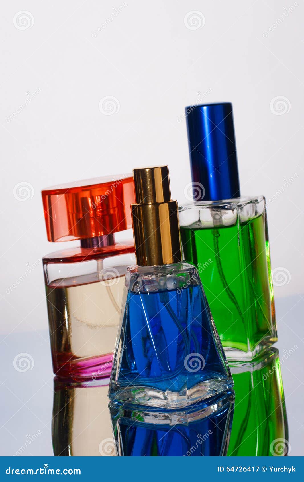 Three perfume bottles stock image. Image of merchandise - 64726417