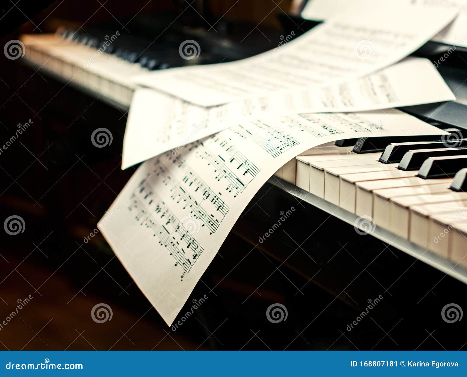 Piano Sheets Falling from Piano Keyboard Stock Image - Image of ...