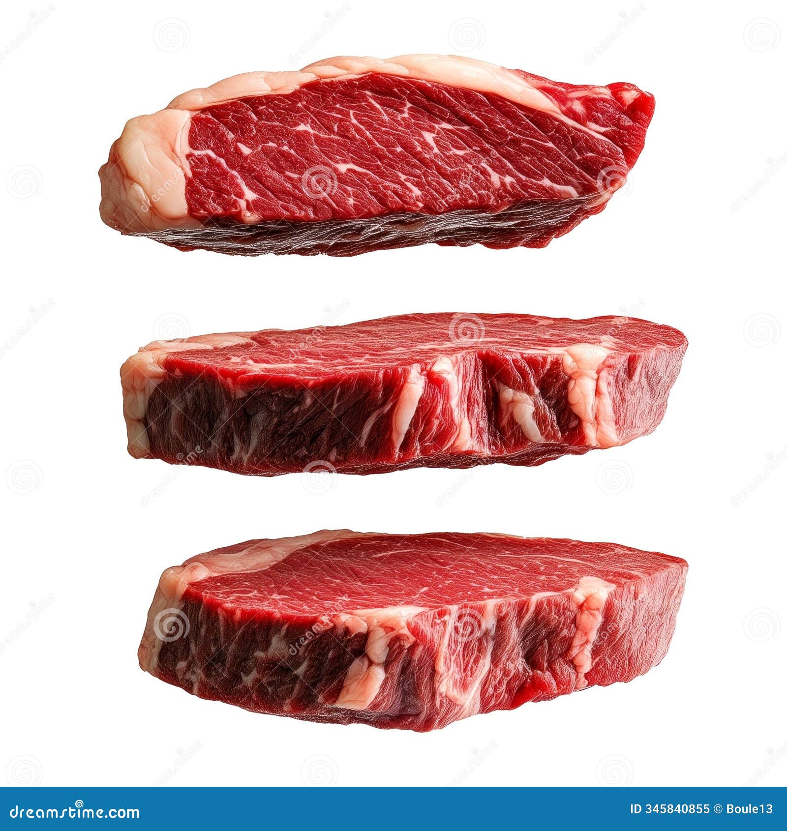 Three Pieces of Beef Steak, Showcasing Marbling, Isolated on a White ...