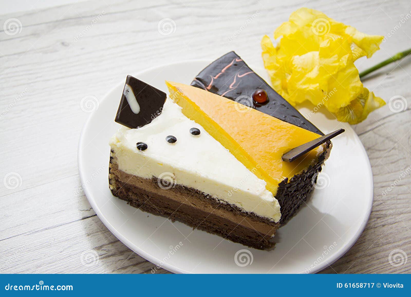 Three Pieces of Cake with Iris Closeup Stock Image - Image of dessert ...