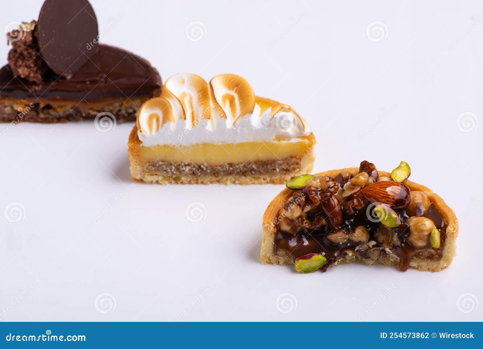 Three Pieces of Cakes Cut in Half Isolated on a White Background Stock ...