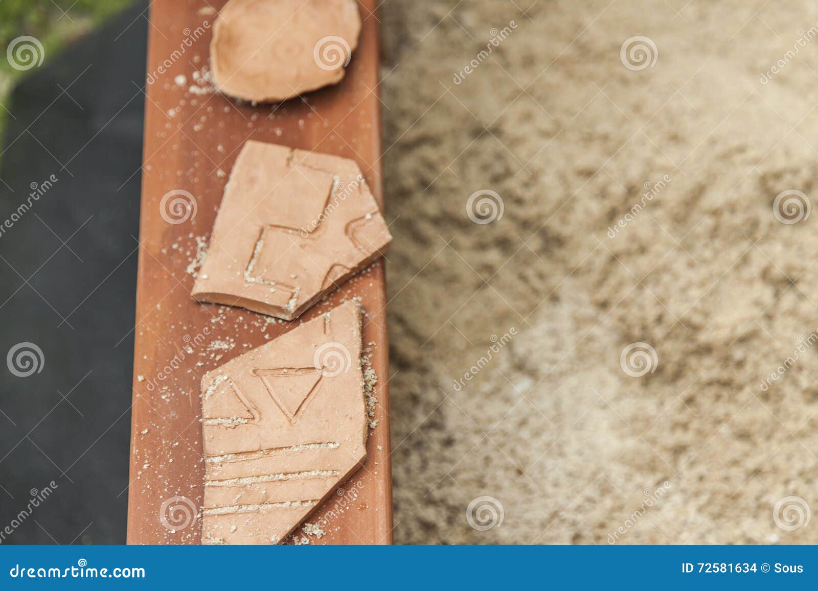 Three Pieces of Pottery in a Sandbox Stock Photo - Image of play, rest ...