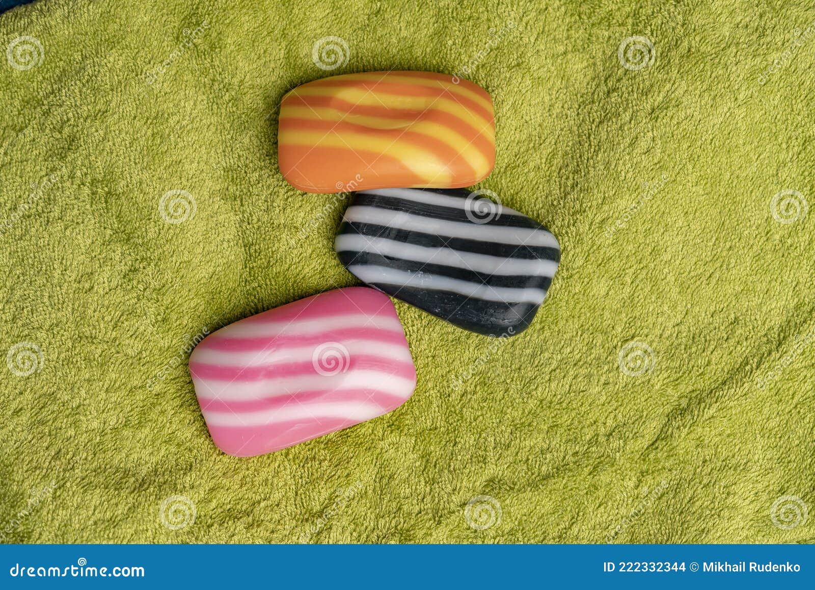The Three Pieces of Striped Soap Bars on the Towel Textile Texture, Spa ...