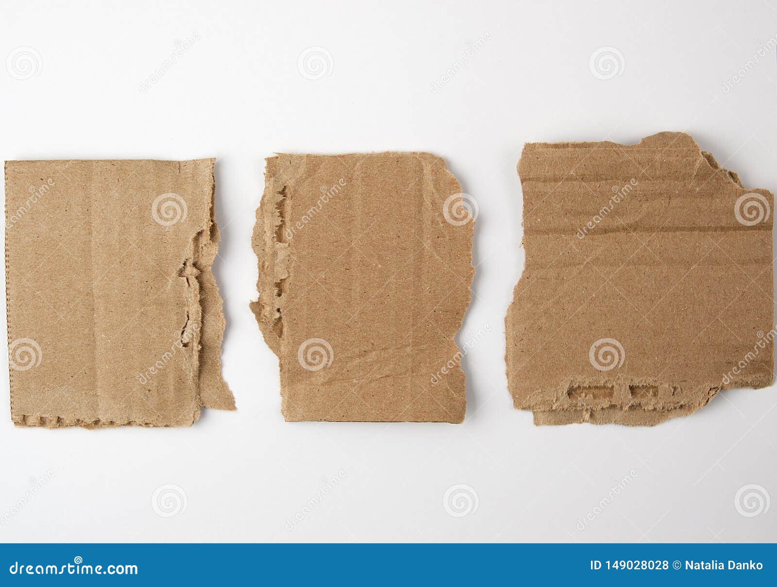 Three Pieces of Torn Brown Paper on a White Background Stock Photo ...