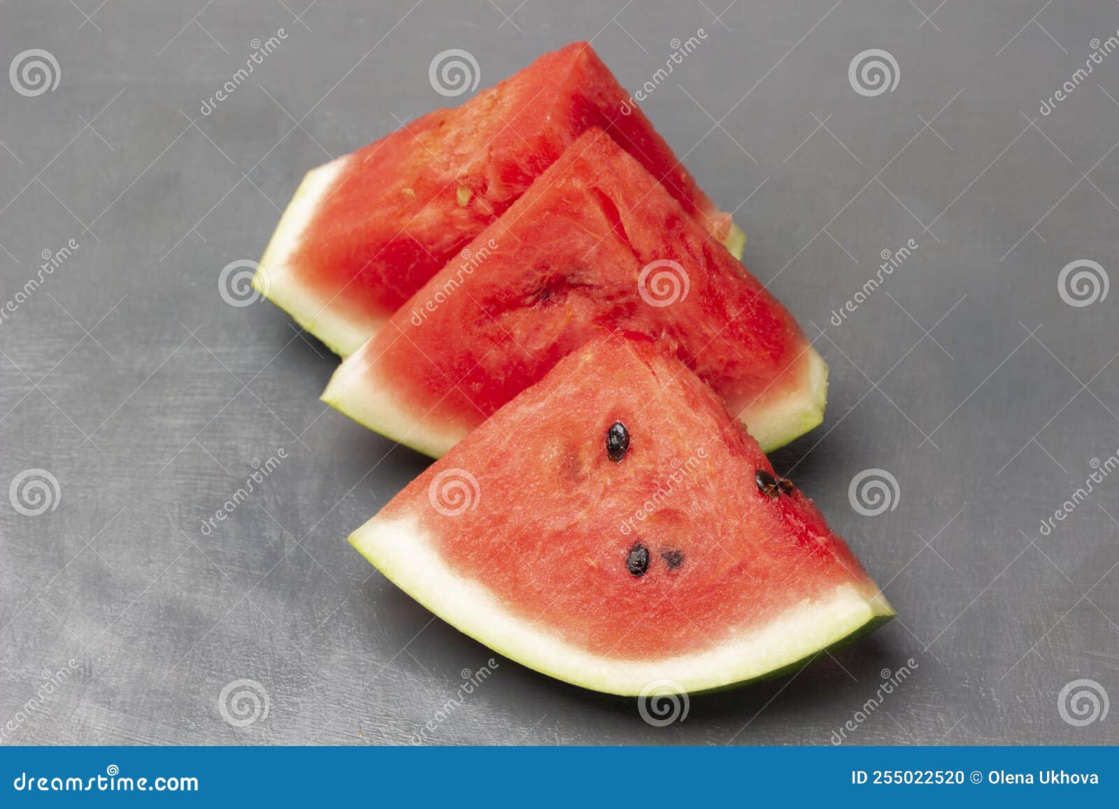 Three Pieces of Watermelon, Part of the Frame. Grey Background Stock ...