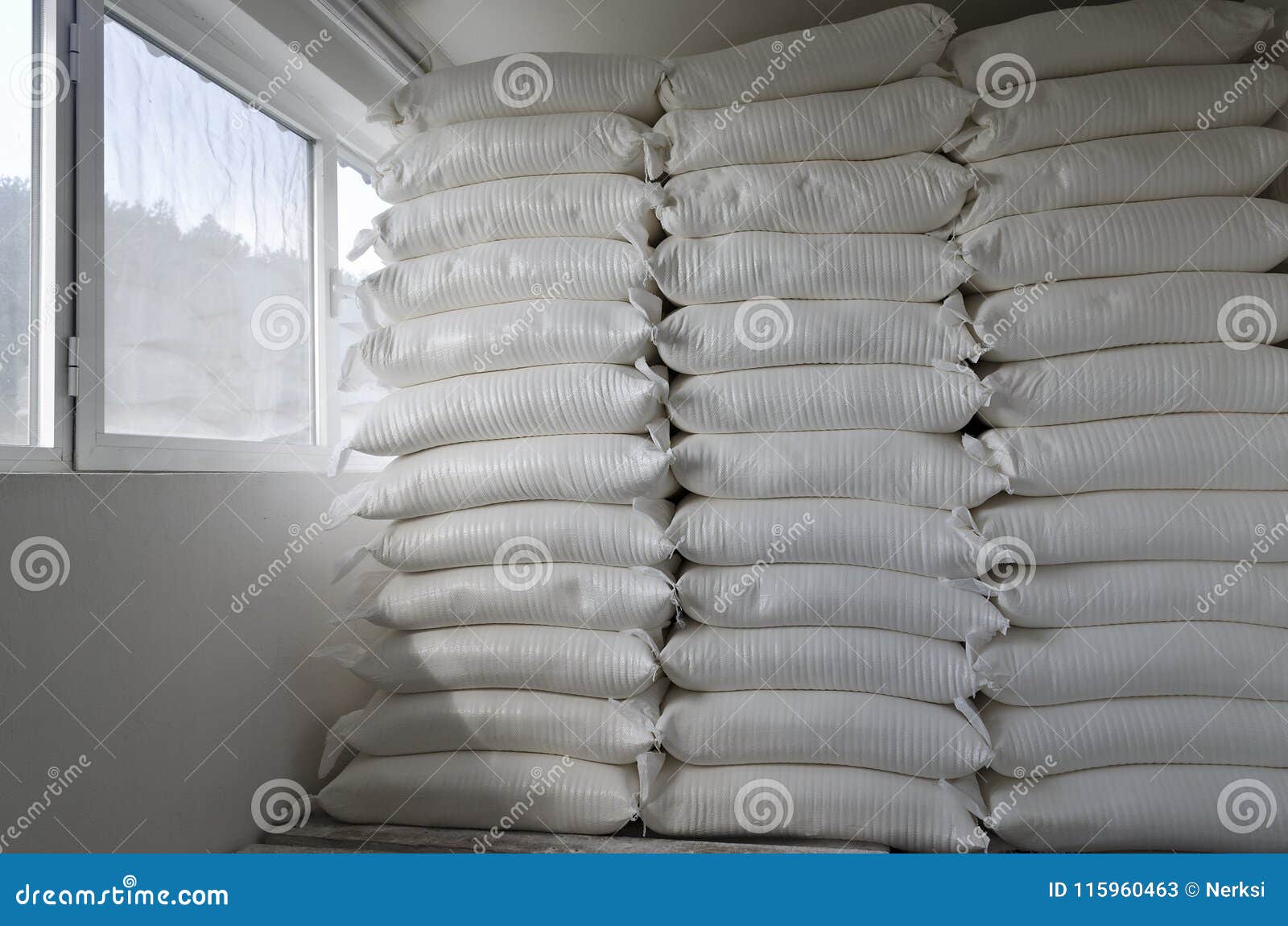 Three piles of big sacks stock image. Image of bulk - 115960463