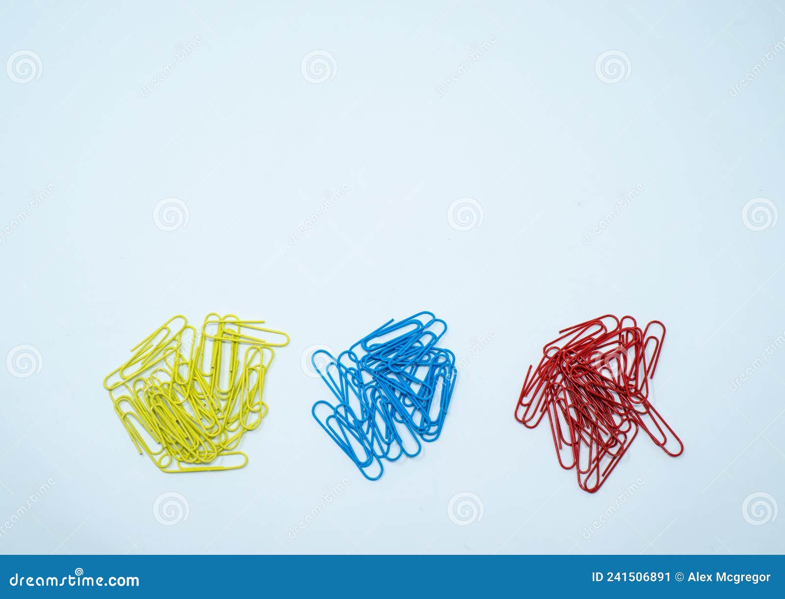 Three Piles of Coloured Paper Clips Stock Image - Image of pattern ...