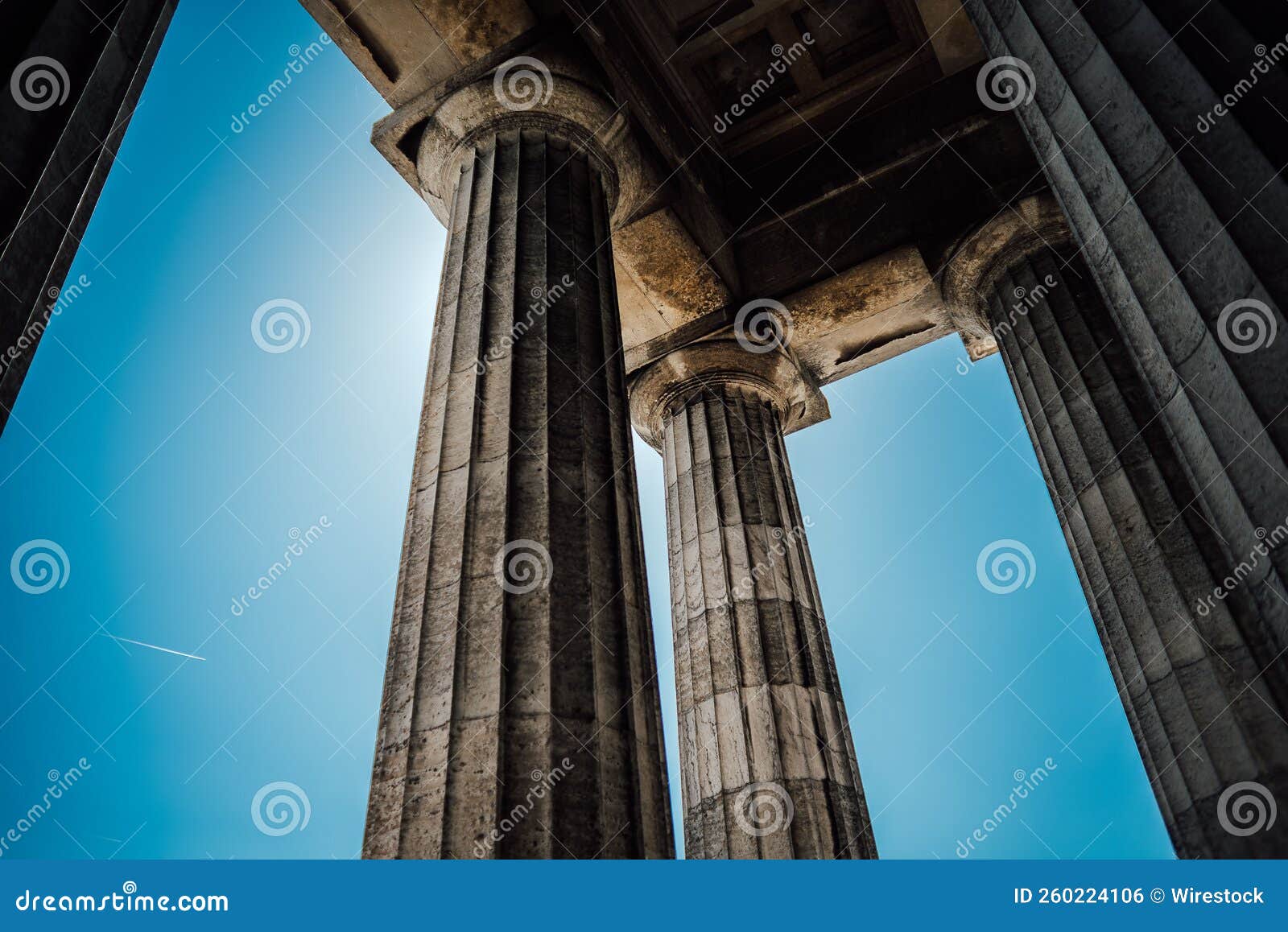 Three Pillars Structure Under a Clear Blue Sky Stock Photo - Image of ...