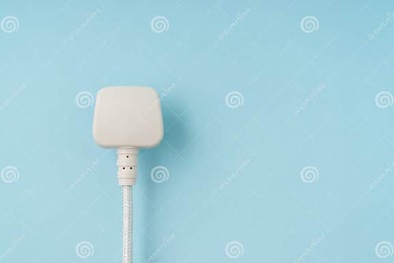 Three Pin Plug on Light Blue Background with a Copy Space Stock Image ...